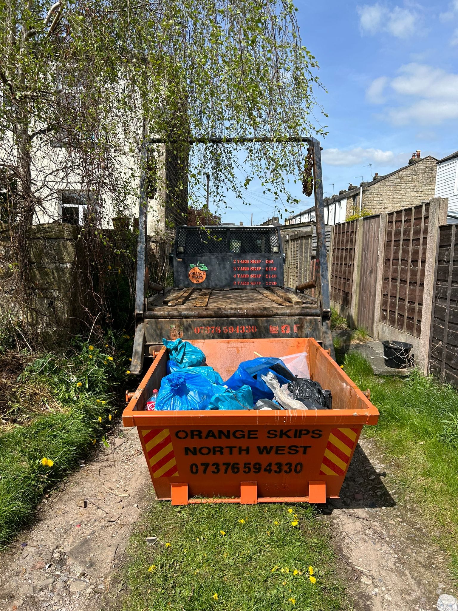 Skips Near Me | Orange Skips NW | Wait & Load Skip Hire