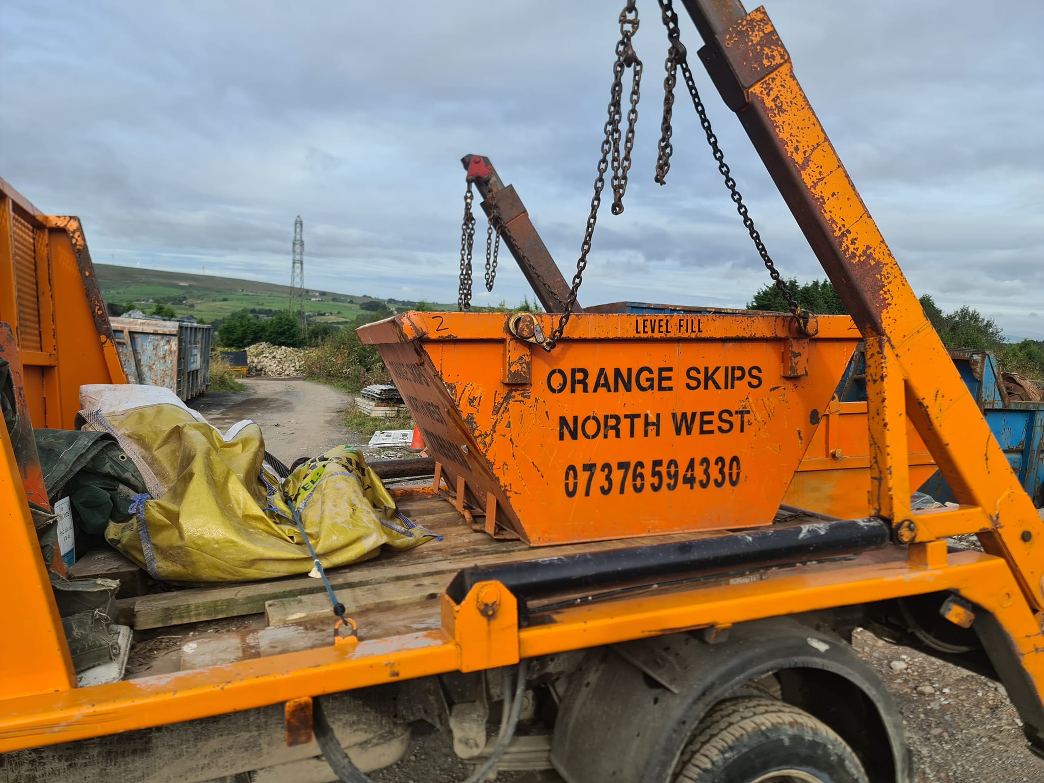 Salford Skip Hire | Orange Skips NW | Book Online Now!